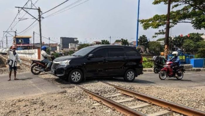 Bagaimana Aturan Perlintasan Kereta Api Tanpa Plang? Ini Penjelasan KAI