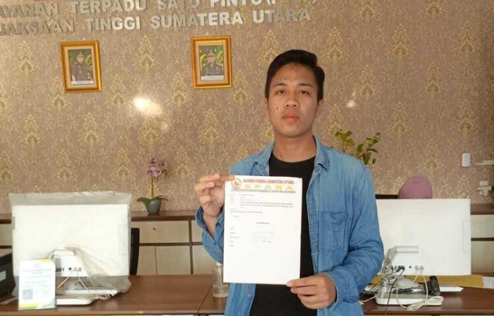 Dilaporkan Pengadaan Kaos Marharoan Bolon, Kadis PMPN Simalungun Bungkam