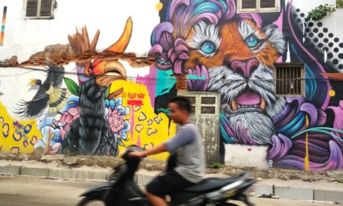 Fokus Lensa : Mural, Membuat Medan Kian Atraktif